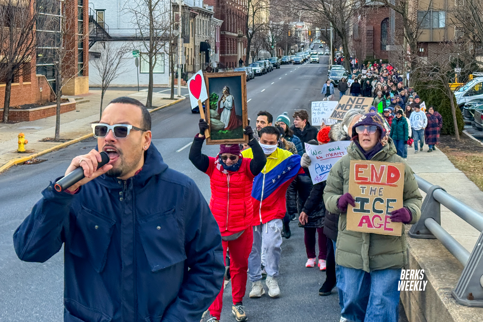 Community holds vigil, march in Reading after Minneapolis ICE shooting ...